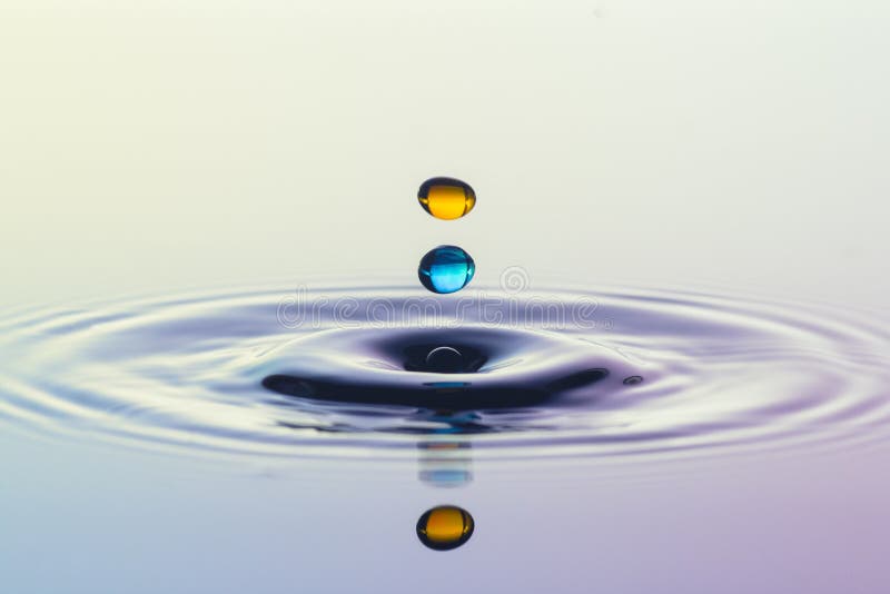 Colored Water Splash, Background of Drop Falling into the Water Stock ...