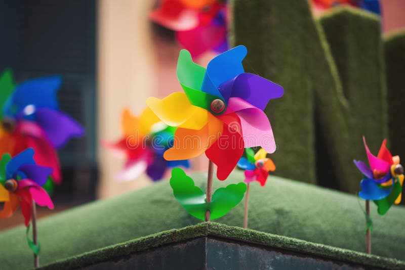 Colored Windmill on the Roof. Colorful Windmills is Waiting the Wind ...