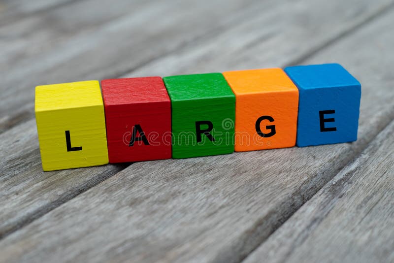Colored Wooden Cubes with Letters. the Word Large is Displayed ...