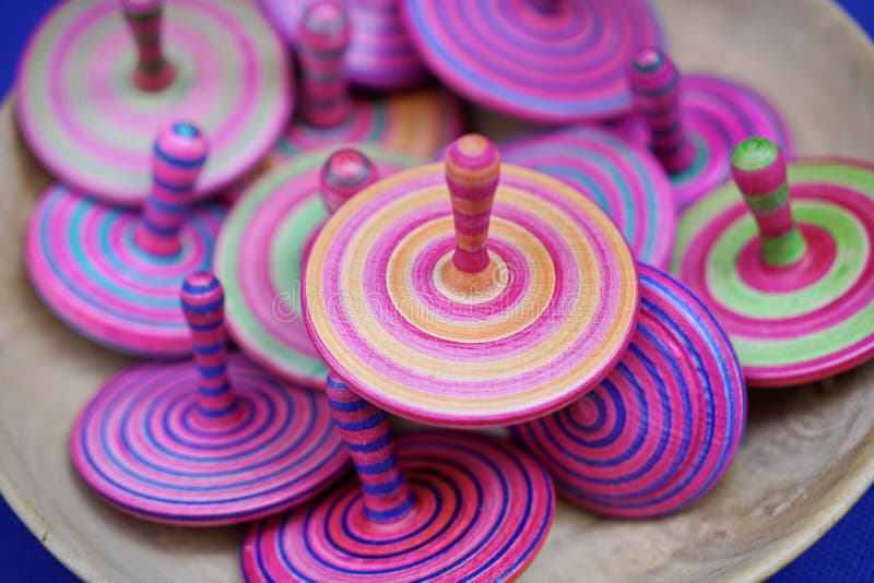 Colored Wooden Spinning Tops, Handcrafted. Stock Image - Image of color ...