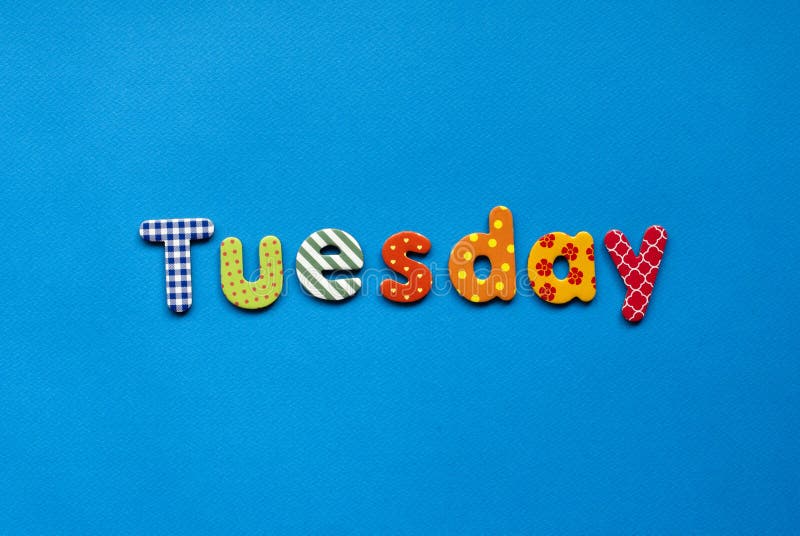 Colored Word Tuesday on Blue Paper Background. Stock Image - Image of ...