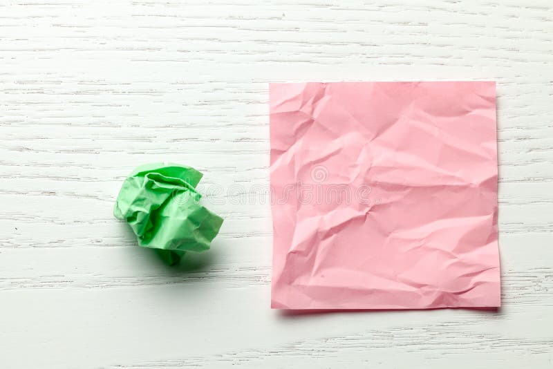 Colored Wrinkled Note Paper on White Wooden Table. Stock Photo - Image ...