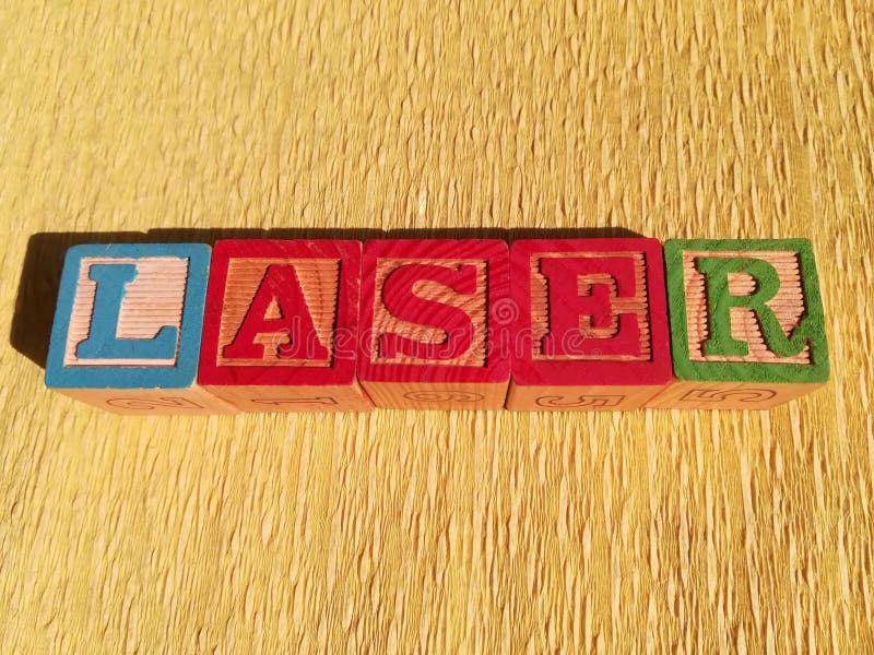 Colored writing: laser stock image. Image of written - 130696719