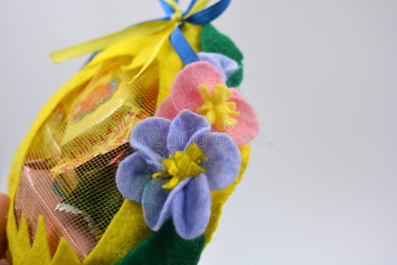 Colored Yellow Packages with Sweets Packed in the Form of an Egg Made ...