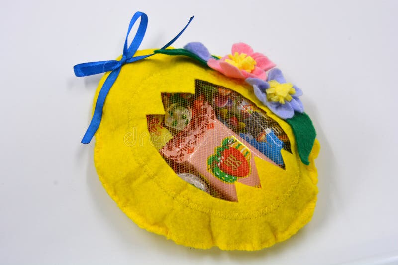 Colored Yellow Packages with Sweets Packed in the Form of an Egg Made ...