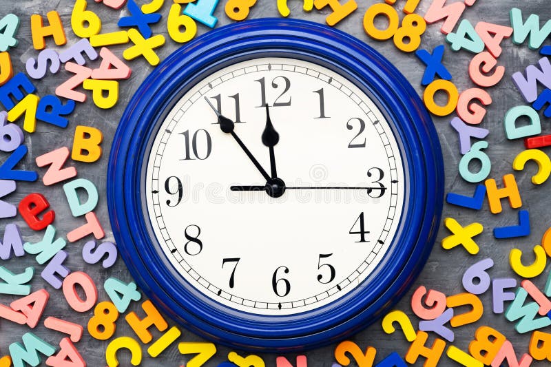 Colorful Alphabet Letters and Clock on Gray Background with Space for ...