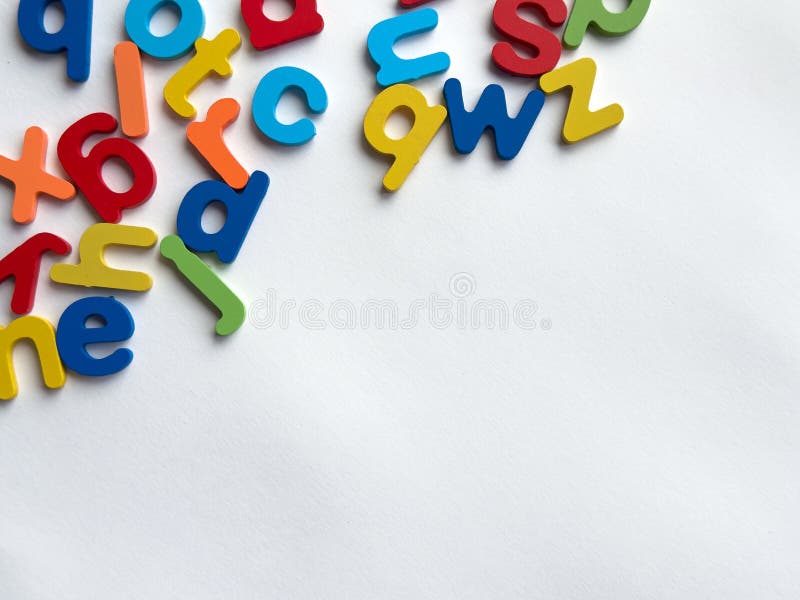 Colorful Alphabet Letters Scattered on White Background for Education ...