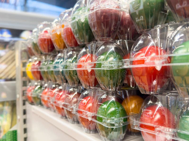Colorful Easter Eggs in Plastic Containers on Grocery Store Shelf Stock ...