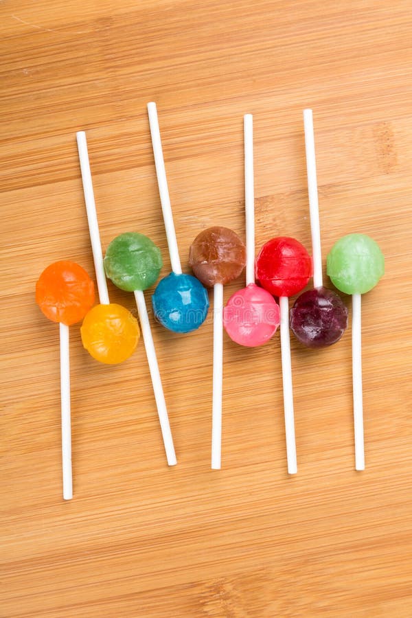 Colorful Arrangement of Candy Suckers on Sticks Stock Photo - Image of ...