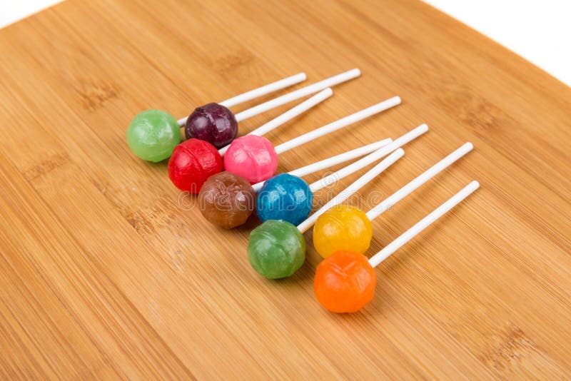 Colorful Arrangement of Candy Suckers on Sticks Stock Photo - Image of ...