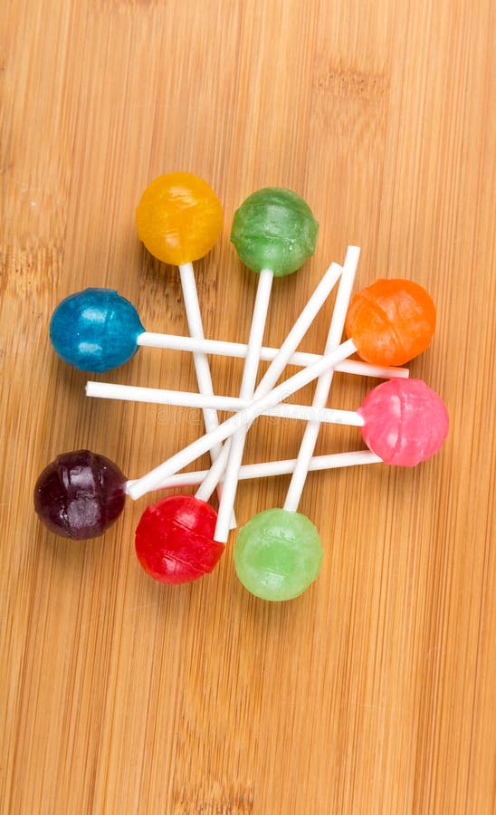 Colorful Arrangement of Candy Suckers on Sticks Stock Photo - Image of ...