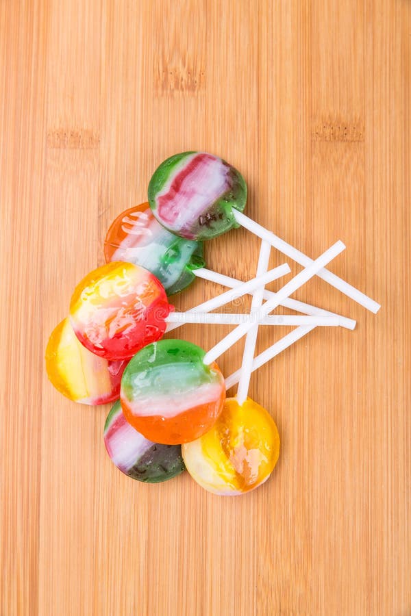 Colorful Arrangement of Candy Suckers on Sticks Stock Photo - Image of ...