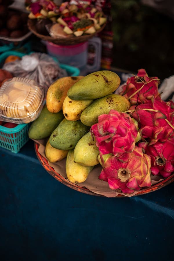 A Lot of Fruit on the Table with Baskets of Nuts Stock Photo - Image of ...