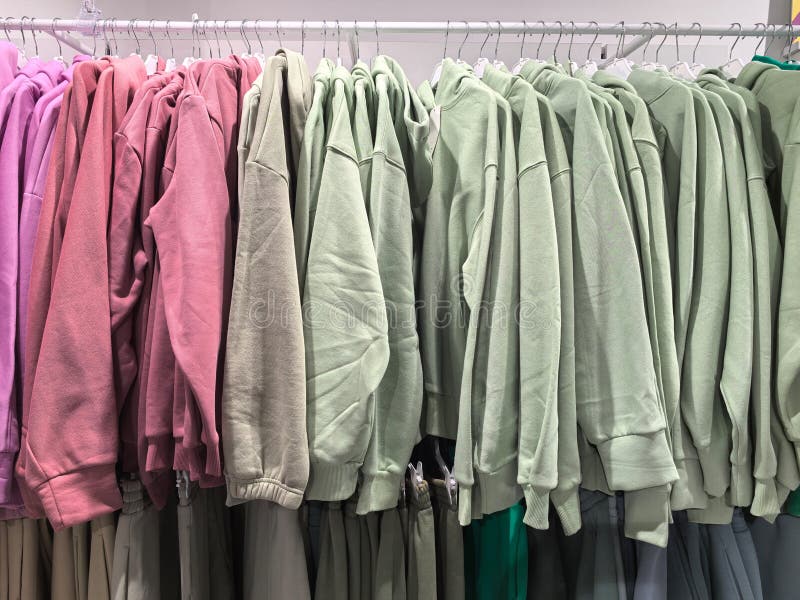 Colorful Array of Hoodies Displayed in a Trendy Retail Store Stock ...