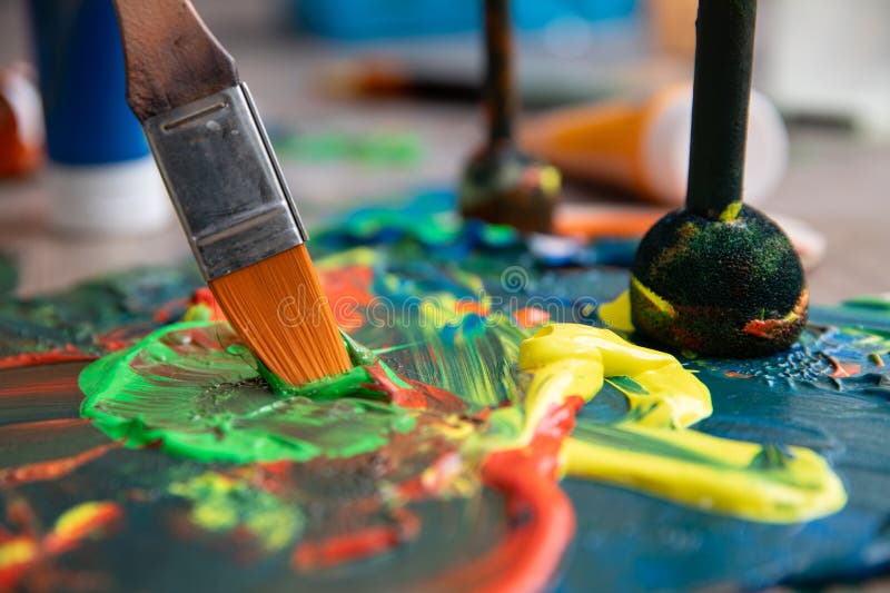 The Colorful Art Creation Process Involves Using a Brush and Various ...