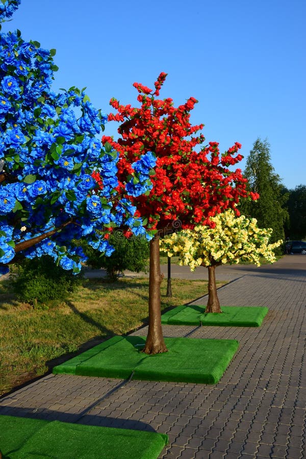 Colorful artificial trees stock photo. Image of park - 41973766