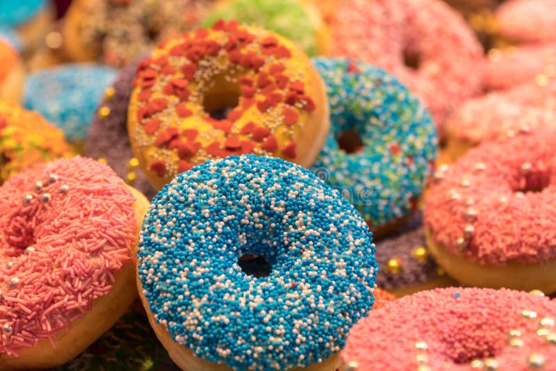 Colorful assorted donuts stock image. Image of donut - 119757315