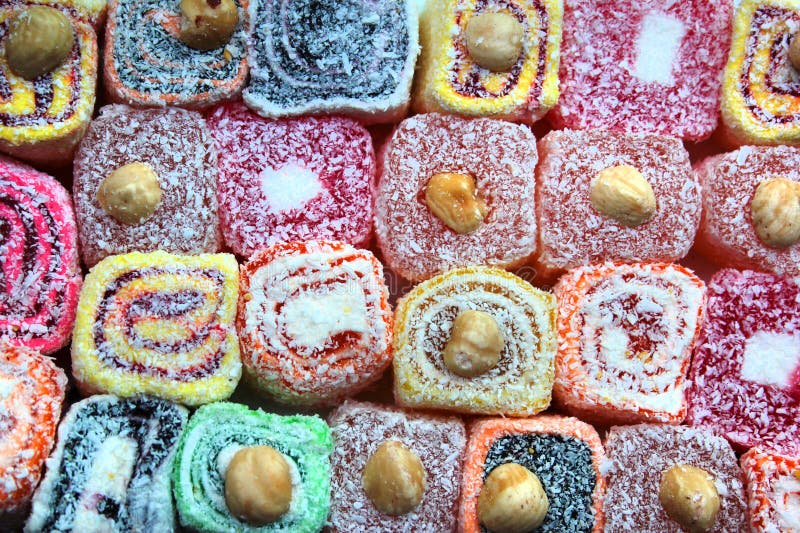 Colorful Assortment of Turkish Delight Rolls Topped with Nuts and ...