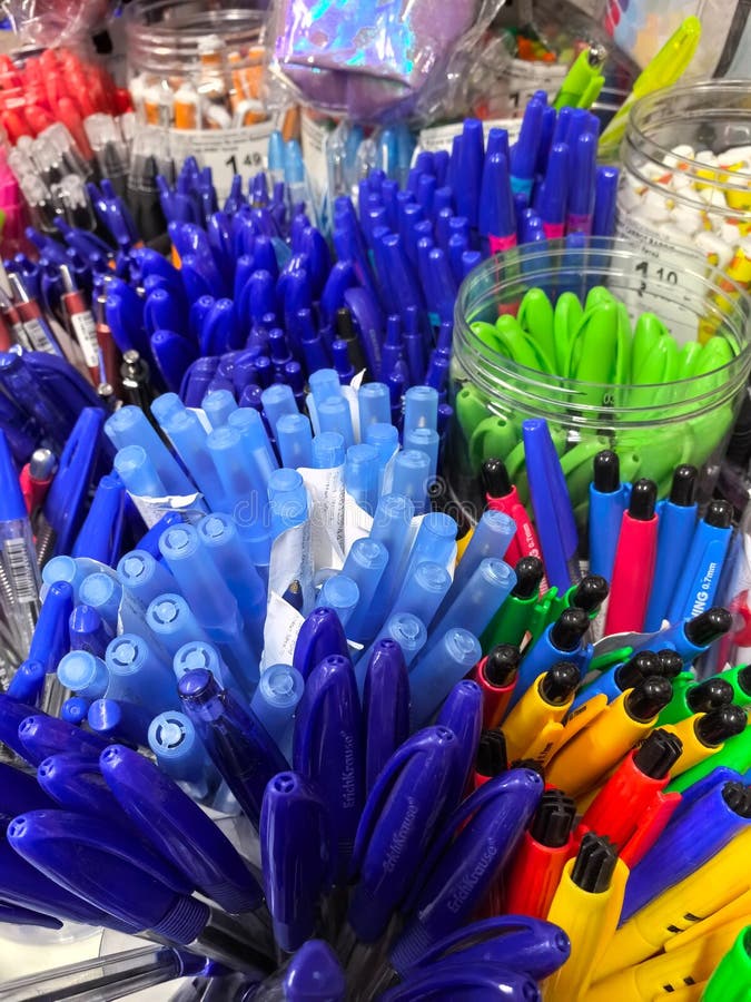 Colorful Assortment of Writing Instruments Fills a Vibrant Workspace ...