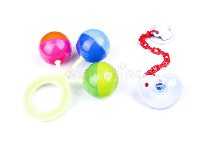 Colorful Baby Rattle and Pacifier Stock Photo - Image of baby, rattle ...