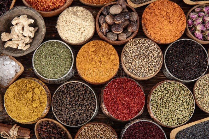 Colorful Background with Various Herbs and Spices for Cooking in Bowls ...
