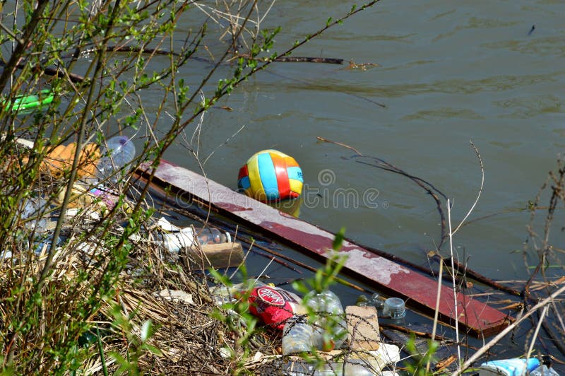 Colorful Ball and Other Trash in the River Stock Photo - Image of trash ...
