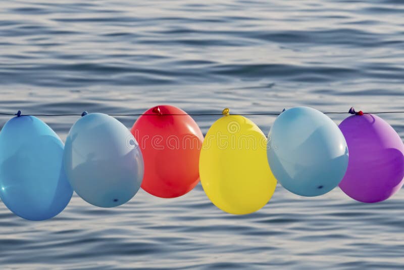 Colorful Balloons on Sea Shore Stock Photo - Image of concept ...