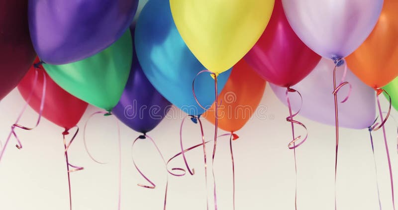 Colorful Balloons Waving on White Background Stock Video - Video of ...