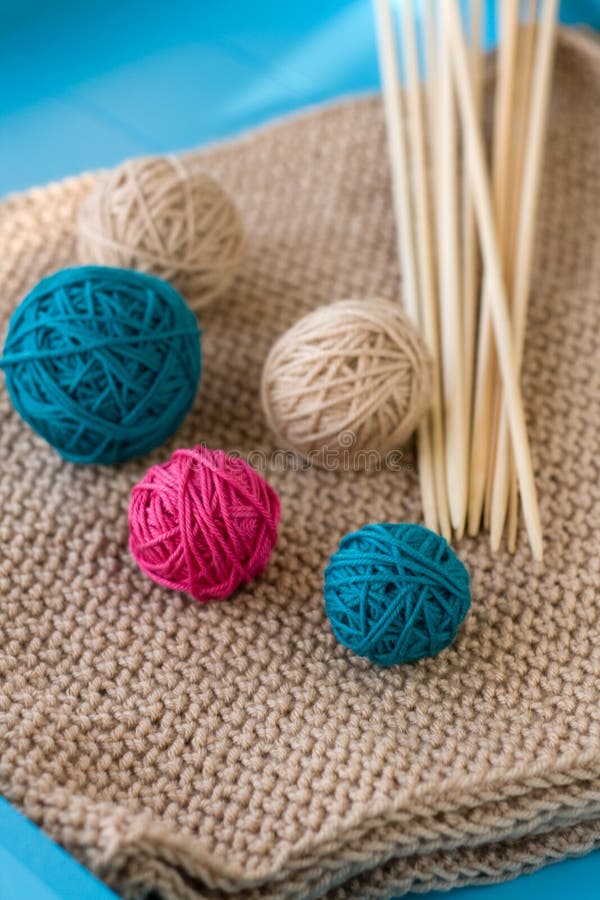 Colorful Balls and Needles Lying on Beige Stock Image - Image of ...