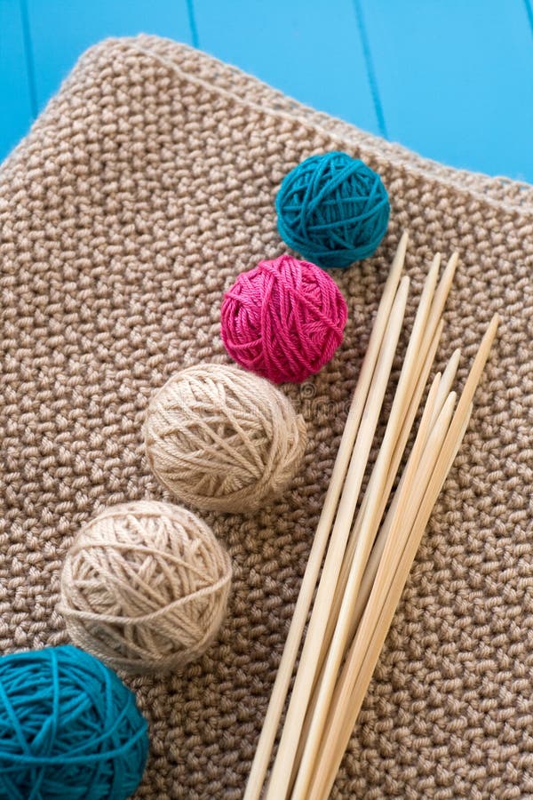 Colorful Balls and Needles Lying on Beige Stock Image - Image of ...