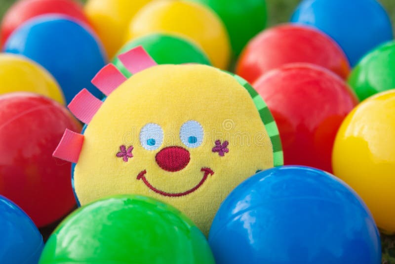 Colorful Balls with Smiling Face Toy in the Middle Stock Photo - Image ...