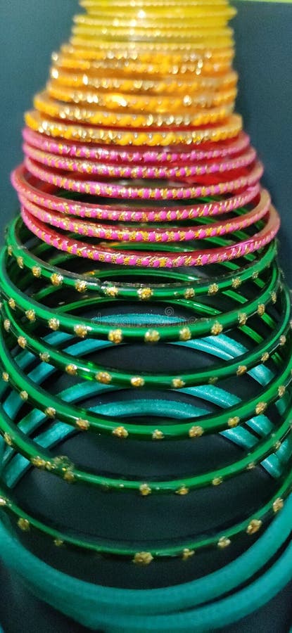 Colorful Bangles Arranged in a Pattern Stock Photo - Image of orange ...