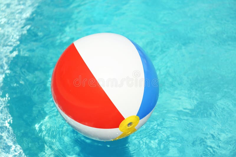 Colorful Beach Ball Floating In Swimming Pool On Sunny Day Stock Image ...
