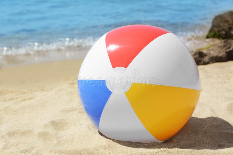 Colorful Beach Ball at Seaside on Sunny Day Stock Image - Image of ...