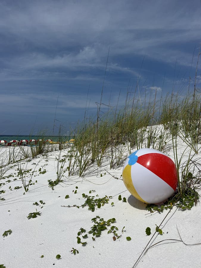 Colorful Beach Ball on White Sand Dunes Stock Image - Image of water ...