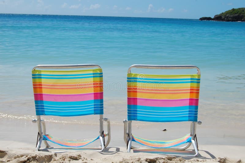 Colorful beach chairs stock image. Image of chair, coastline - 5591423