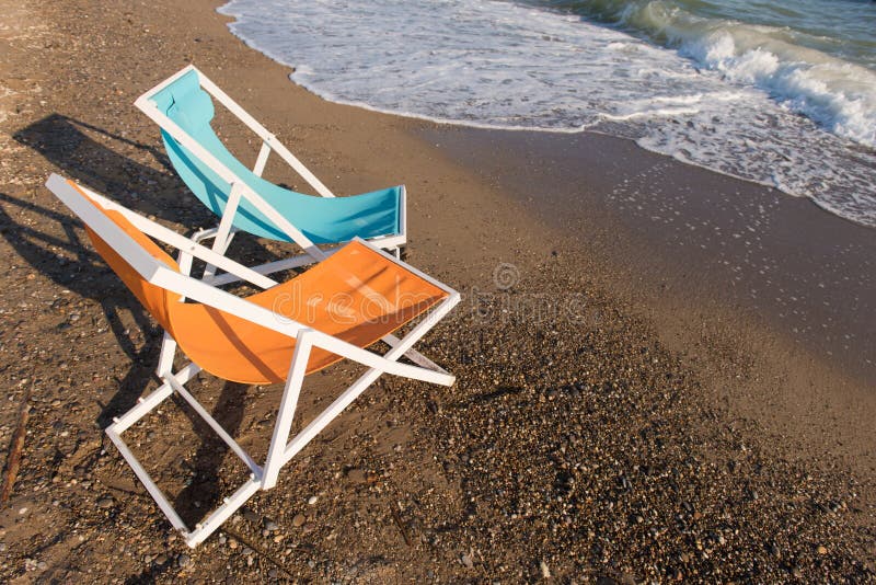 Colorful beach chairs stock photo. Image of calm, relax - 77353512