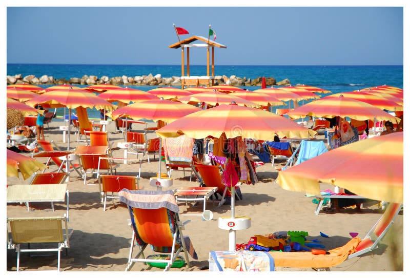 Colorful Beach Umbrellas on a Mediterranean Sandy Beach. Stock Image ...