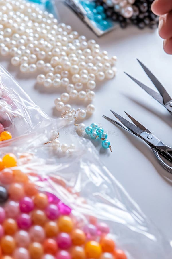 Colorful Beads and Pearl Jewelry Making Process High Quality Image ...