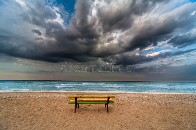 Colorful bench on a beach stock image. Image of sand - 26390345