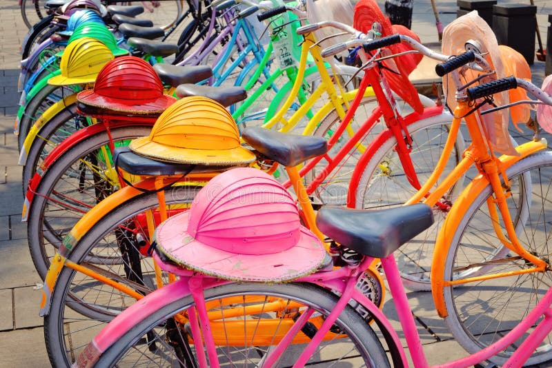Colorful bicycles and hats stock photo. Image of travel - 32841894