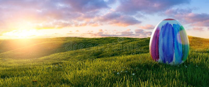 Colorful Big Painted Easter Egg at Easter on Sunrise or Sunset on a ...