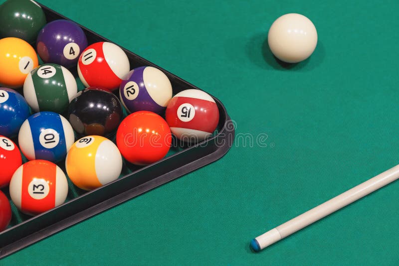 Colorful Billiard Balls with Numbers with Cue Sticks and Rack on Blue ...