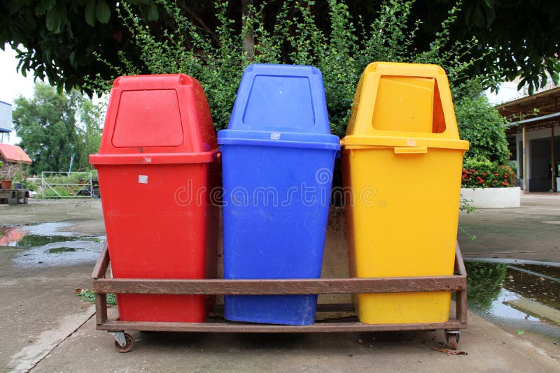 Colorful Bin Under the Tree. Stock Photo - Image of cage, yellow: 156170460