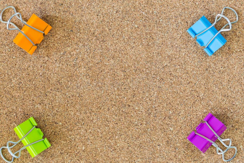 Colorful Binder Clips on Cork Board Stock Photo - Image of banker ...