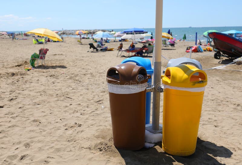 Colorful Bins for Separate Waste Collection on the Beach by the ...