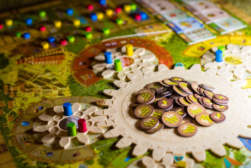 Colorful Boardgame with Cogwheels, Figurines, Chips and Playing Cards ...