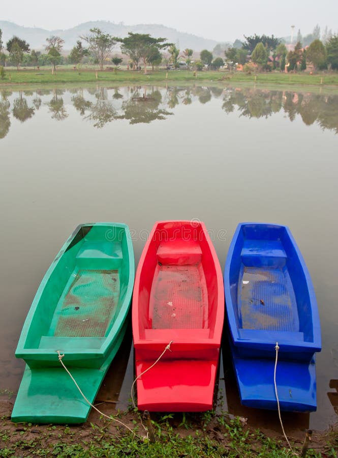Colorful boat in lake stock photo. Image of peace, green - 23863576