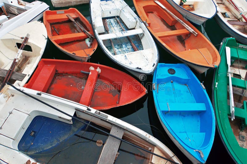 Colorful Boat Reflections on Wavy Water Stock Photo - Image of ...