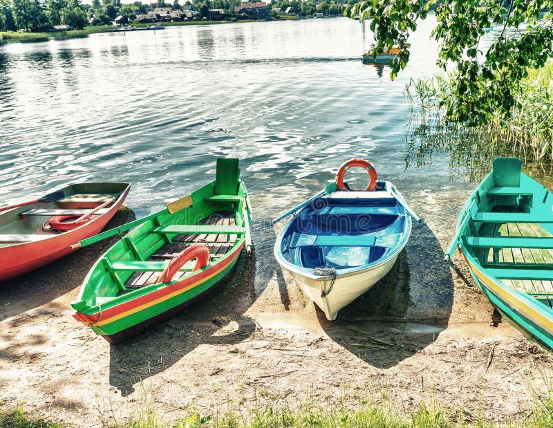 Colorful Boats on Lake Shore Stock Image - Image of blue, peaceful ...